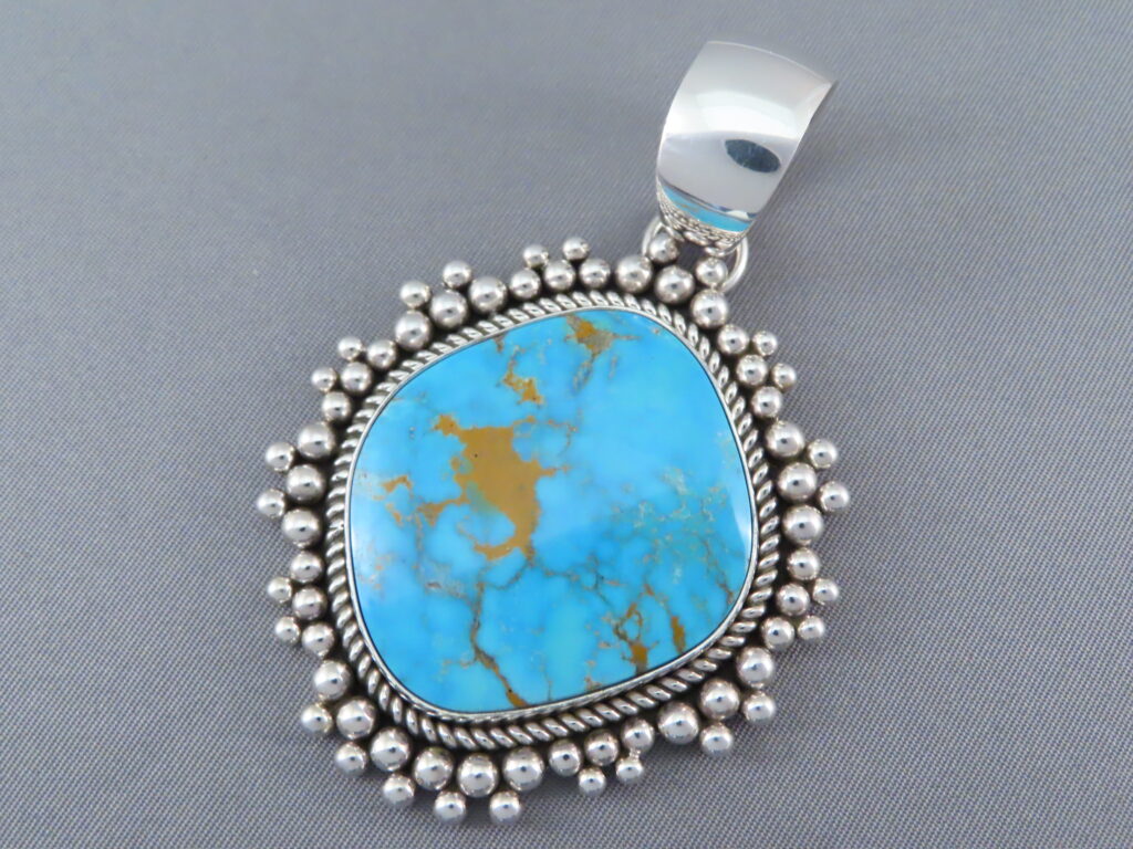 Morenci Turquoise & Sterling Silver Pendant by Artie Yellowhorse (Navajo)